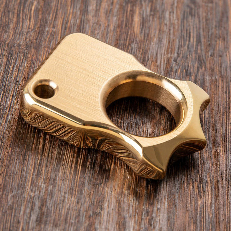 Single-finger brass knuckle